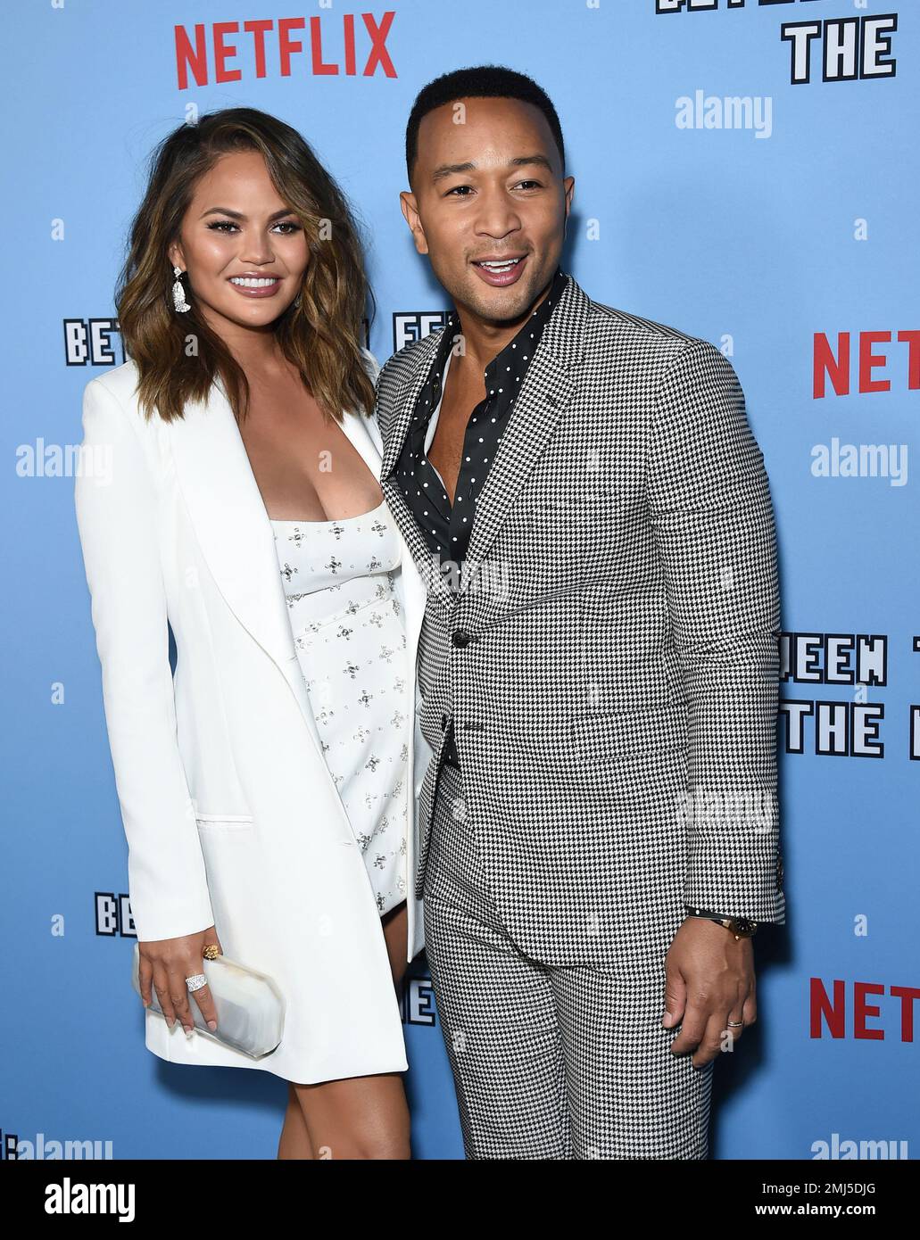 Chrissy Teigen, left, and John Legend arrive at the Los Angeles ...