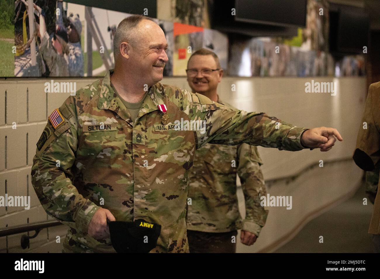 Master Sgt. Donald Siltman exits the Illinois Military Academy ...