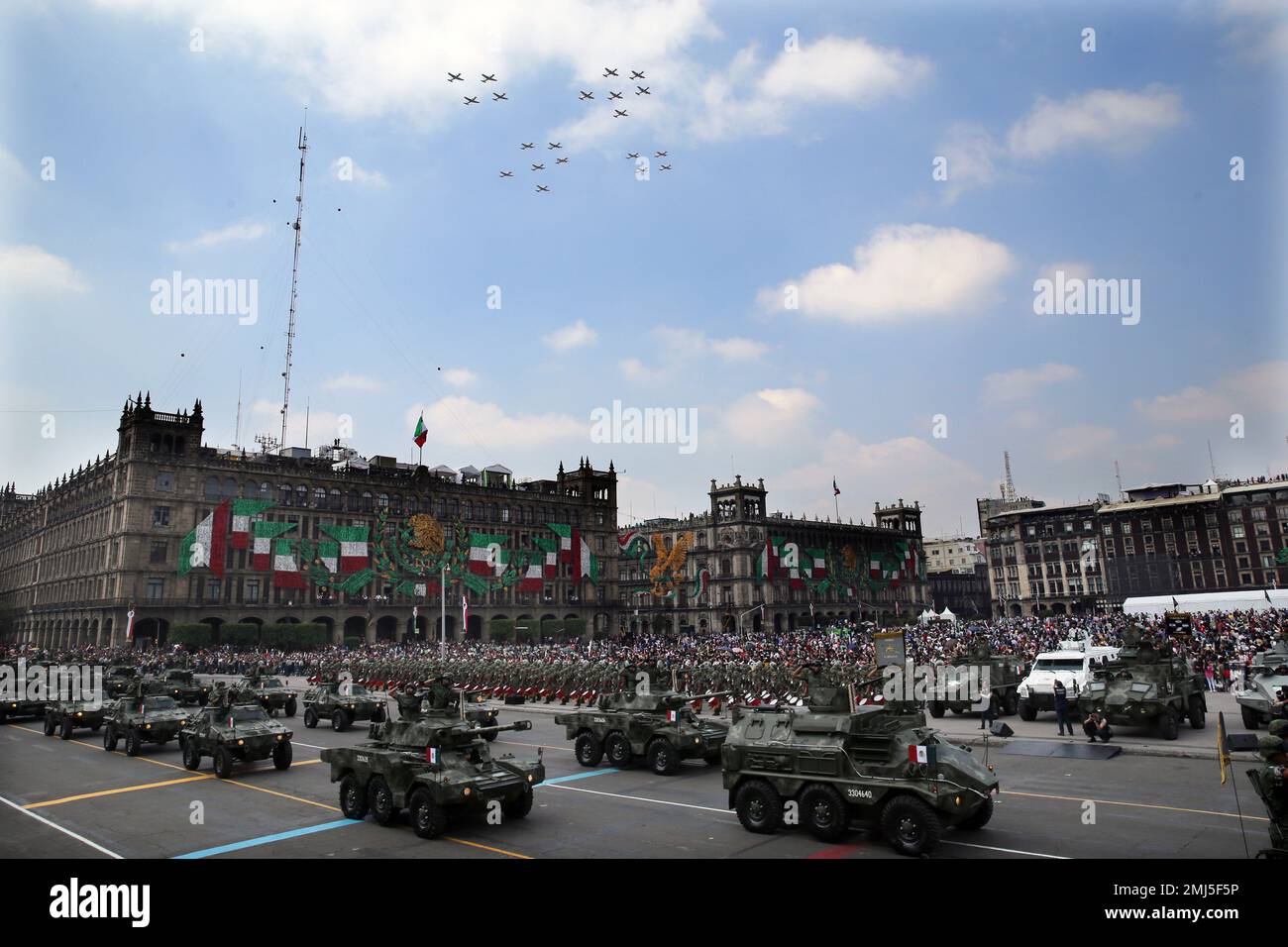 Army vehicles move across the Zocalo during the Independence Day ...