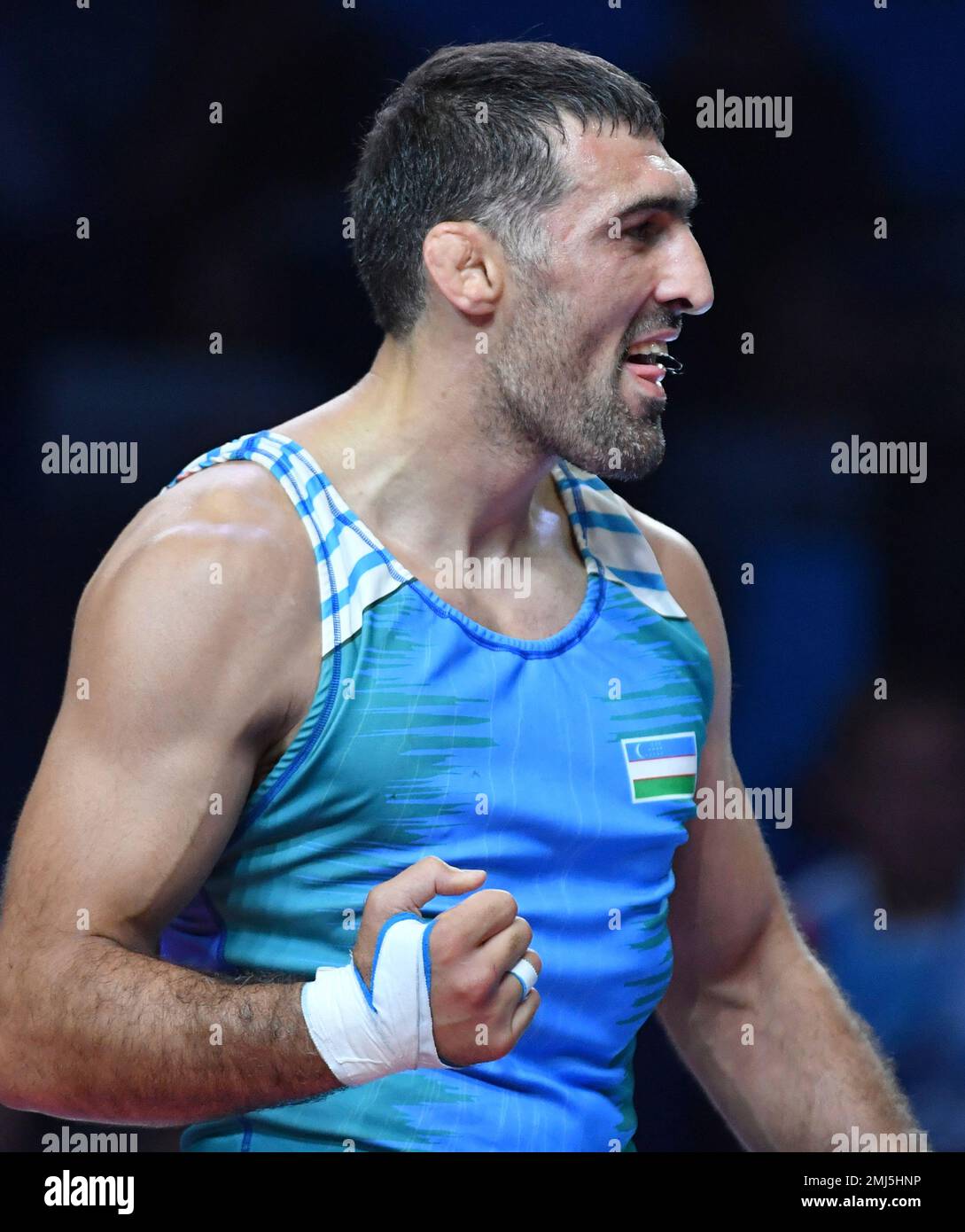 Rustam Assakalov of Uzbekistan celebrates his victory over Atabek ...