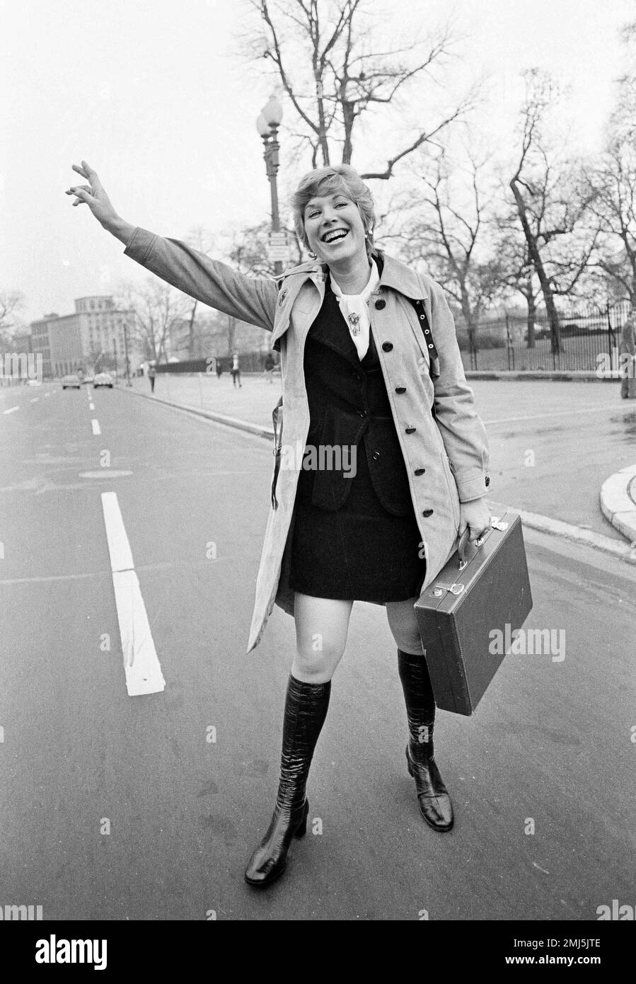 Jill Volner, assistant special prosecutor, hails a taxi outside the ...