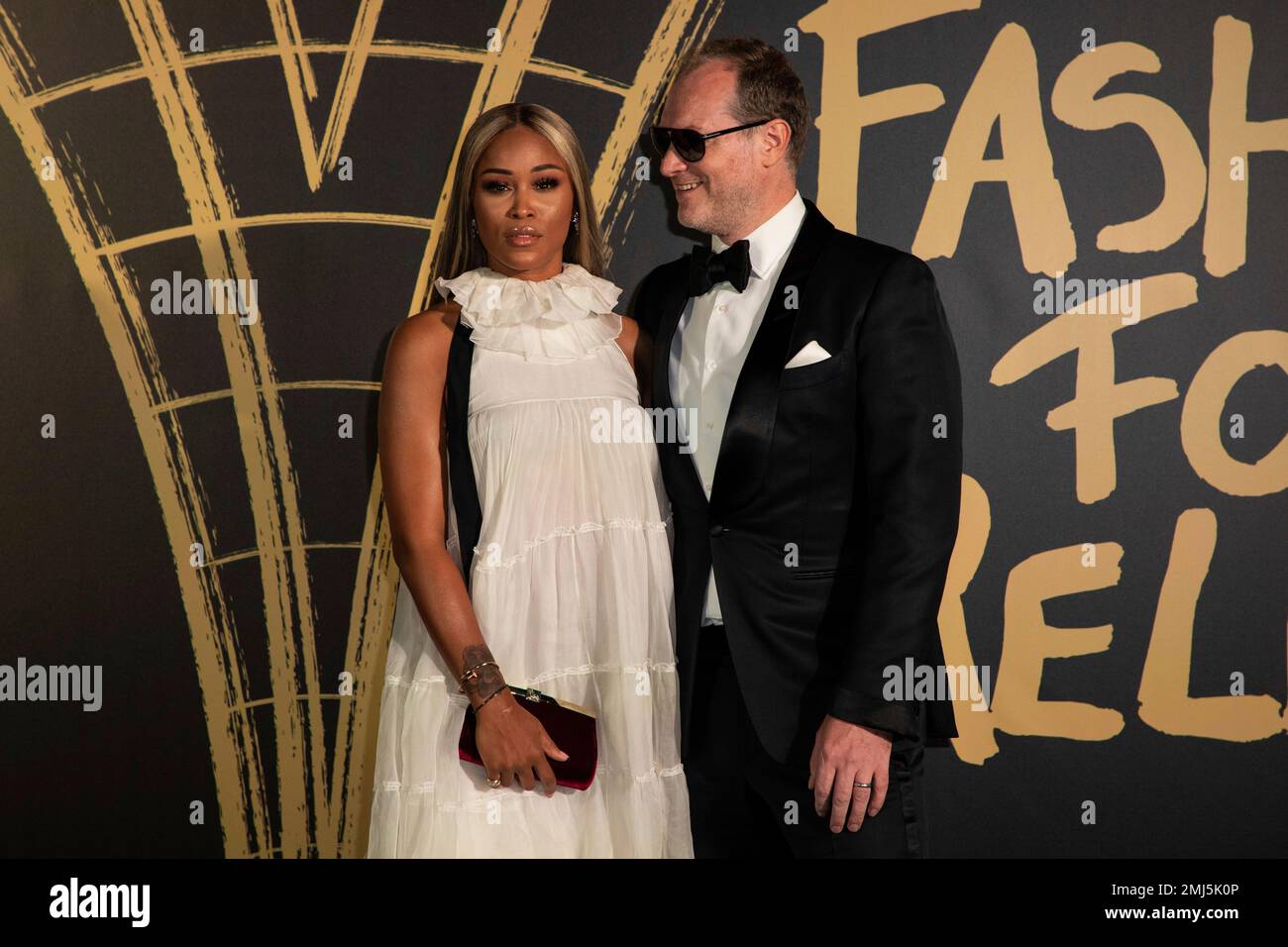 Eve poses for photographers upon arrival at the Fashion For Relief ...