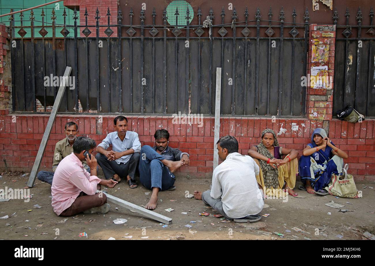 In this photo taken Sunday, Sept. 8, 2019, Indian daily wage laborers ...