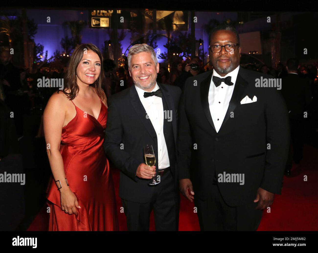 Julie Lambert, from left, Francois Lambert, and Wendell Pierce attend ...