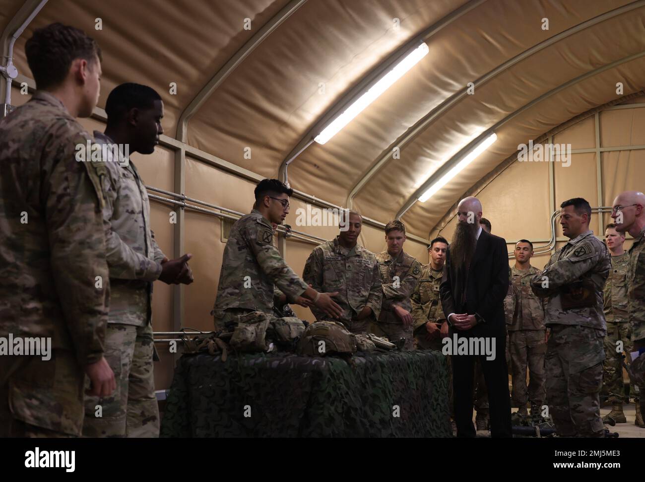 Charge d’Affaires, U.S. Embassy Kuwait, James Holtsnider, listens as ...