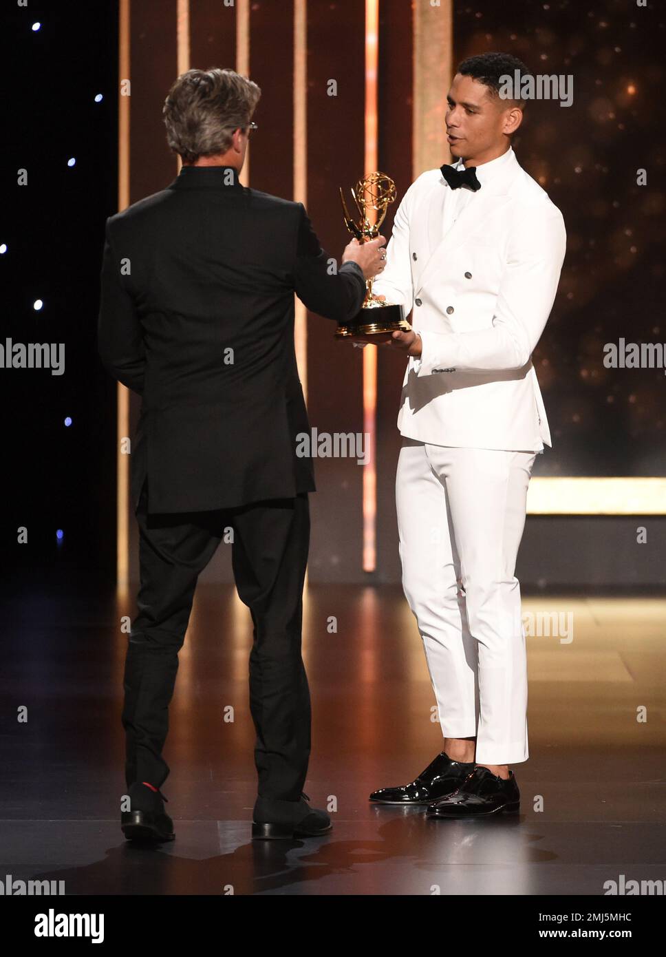 EXCLUSIVE - Angus Wall, left, accepts the award from Charlie Barnett ...