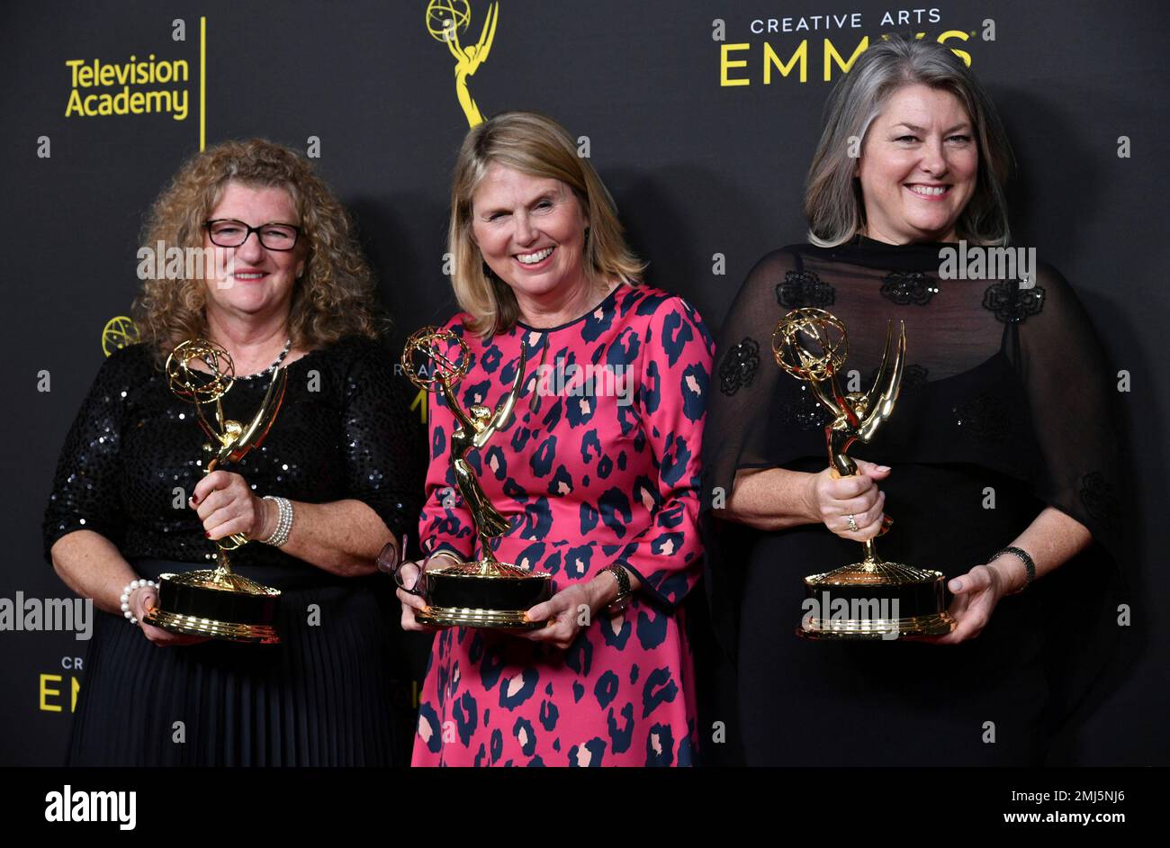 Jane Walker, from left, Kay Bilk, and Pamela Smyth pose in the press ...