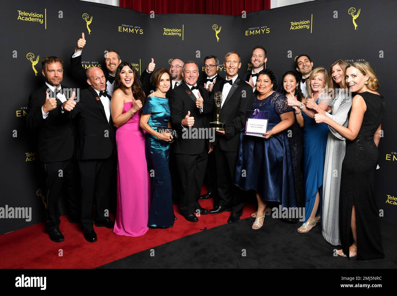 The team from NASA Jet Propulsion Laboratory poses for a portrait with ...