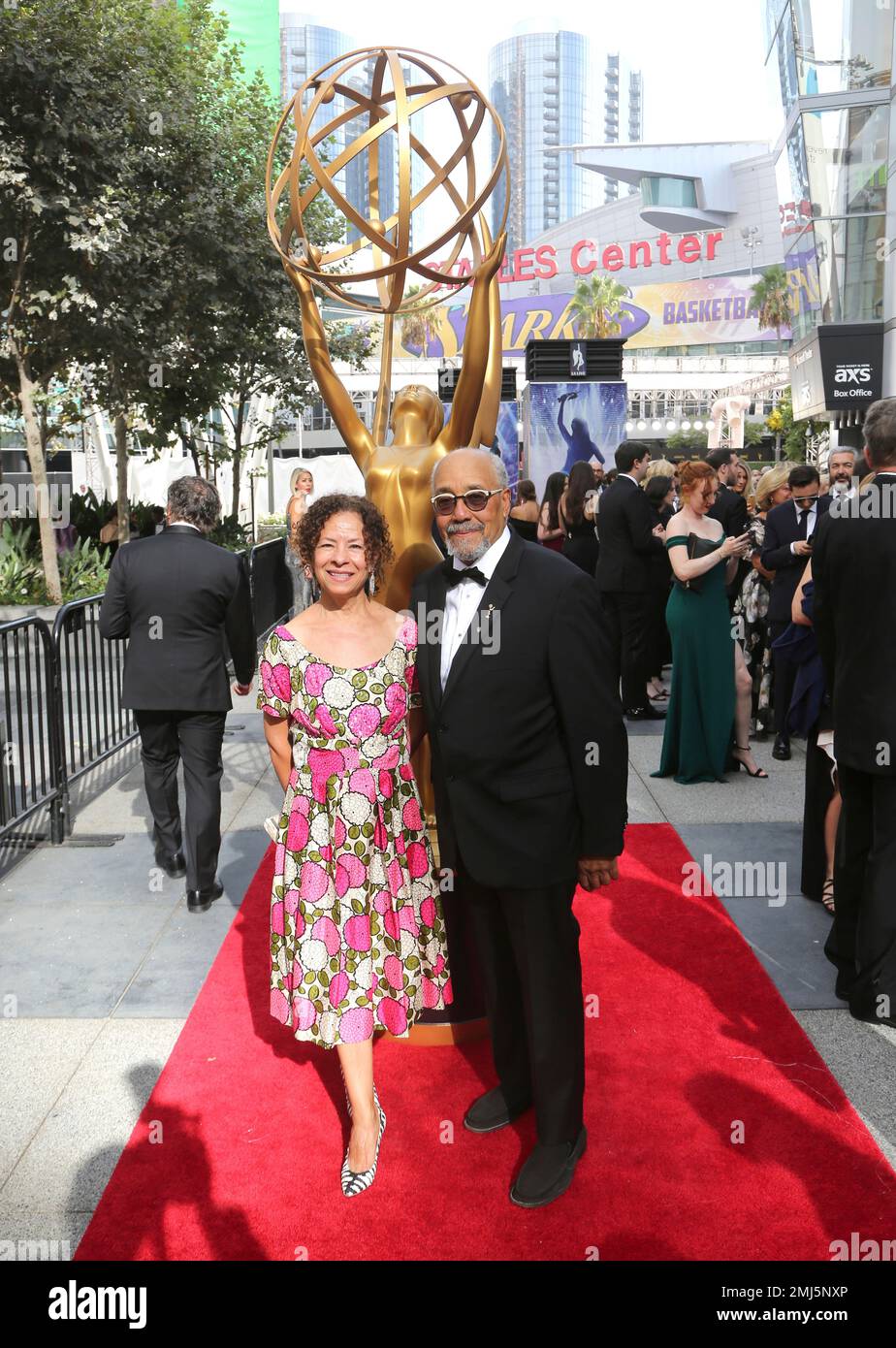 EXCLUSIVE - John Simmons, right, and Cynthia Simmons arrive at night ...