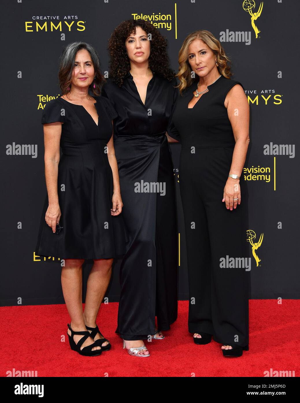 Amy Schatz, from left, Sara Rodriguez and Melody Herzfeld arrive at ...