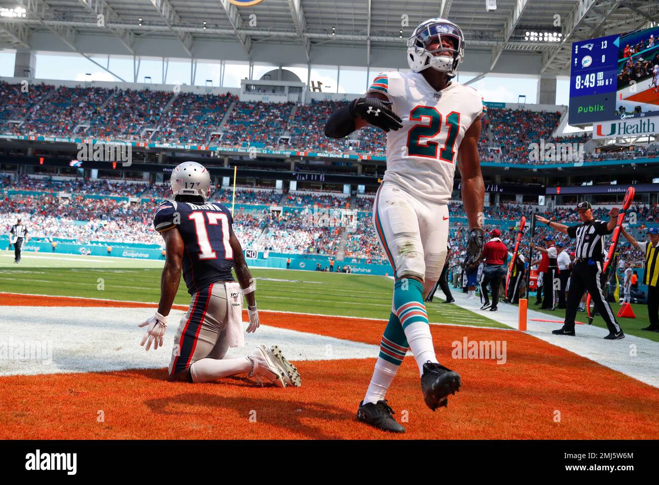 Miami Dolphins cornerback Eric Rowe (21) cheers after defending New ...