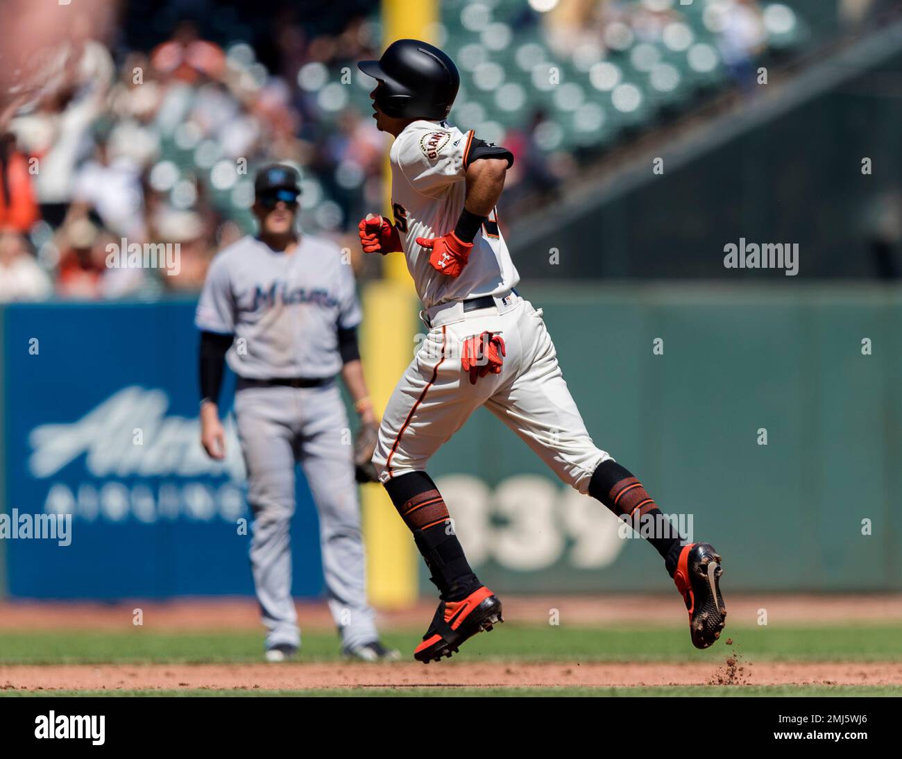 San Francisco Giants' Mauricio Dubon runs the bases after hitting a ...