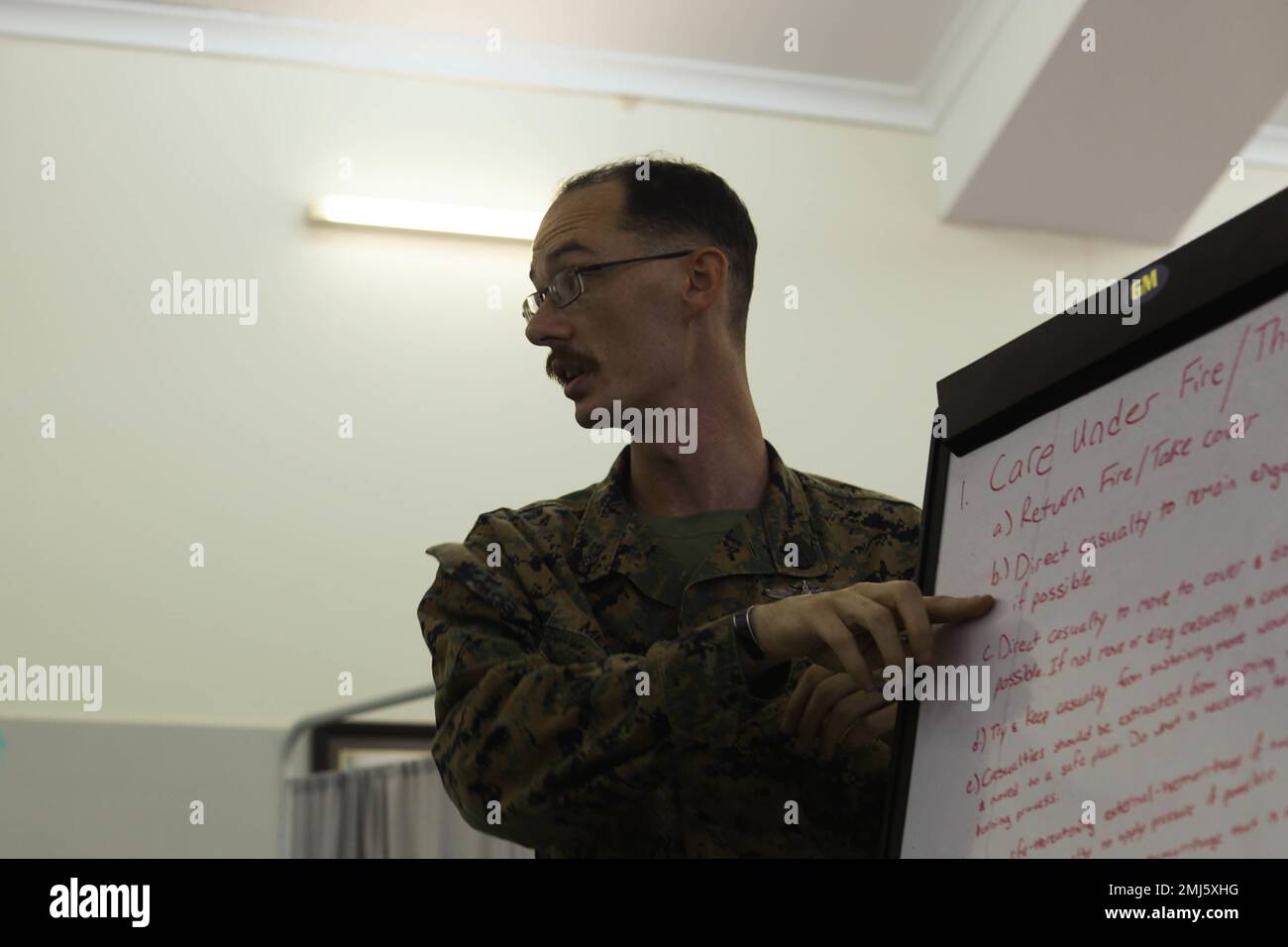 U.S. Navy Hospital Corpsman 2nd Class George Merritt, a preventative ...