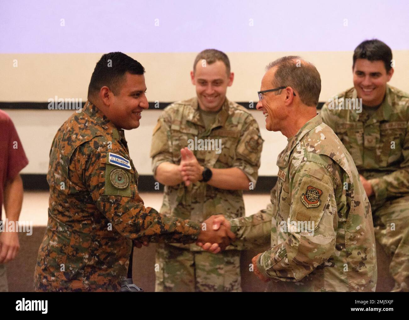 Airmen, Soldiers and civilians from El Salvador and the New Hampshire National Guard exchange ...