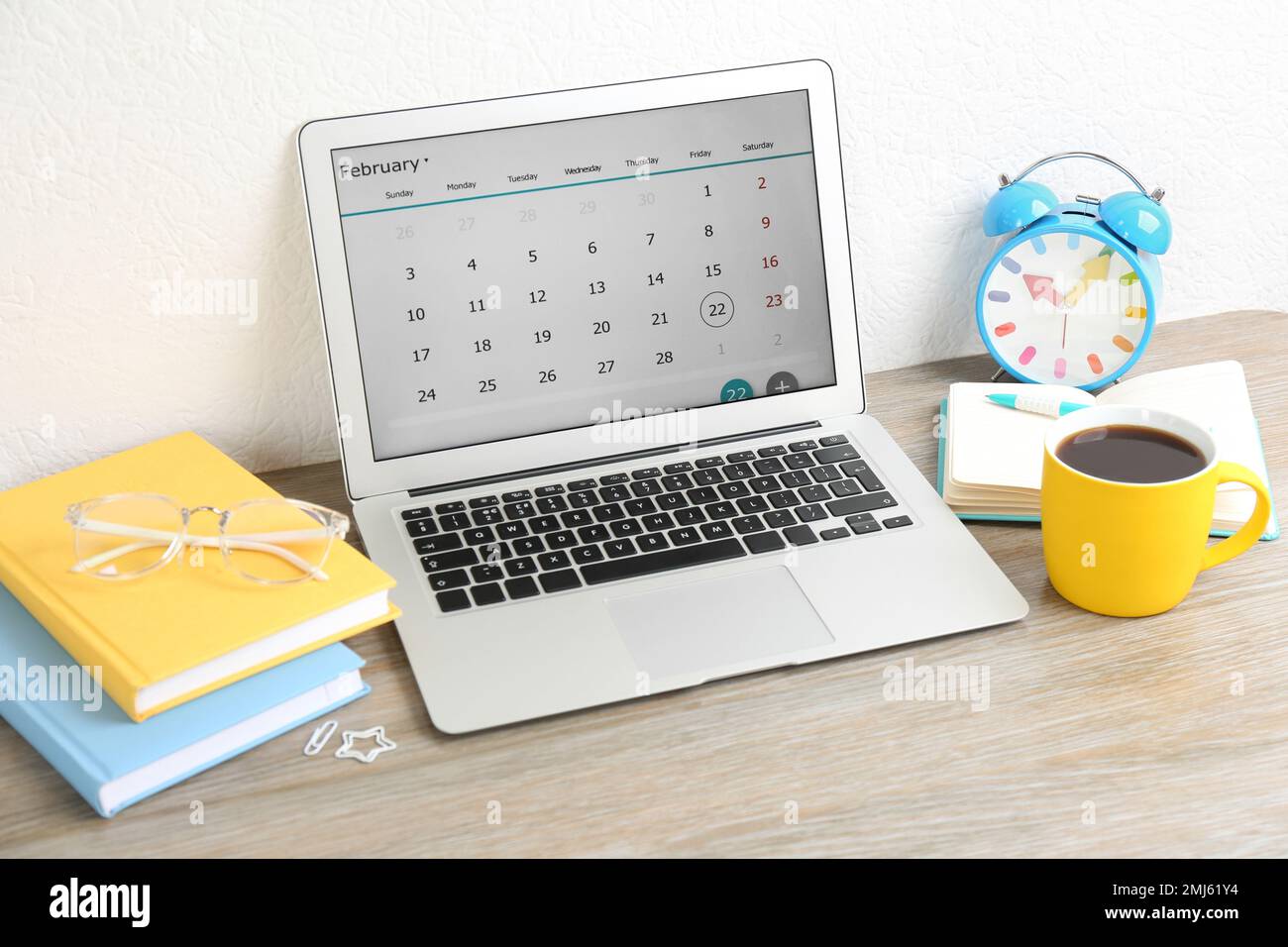 Modern laptop with calendar app in office Stock Photo - Alamy