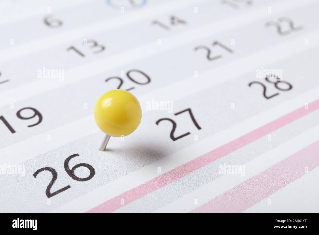 Calendar page marked with drawing pin, closeup Stock Photo - Alamy