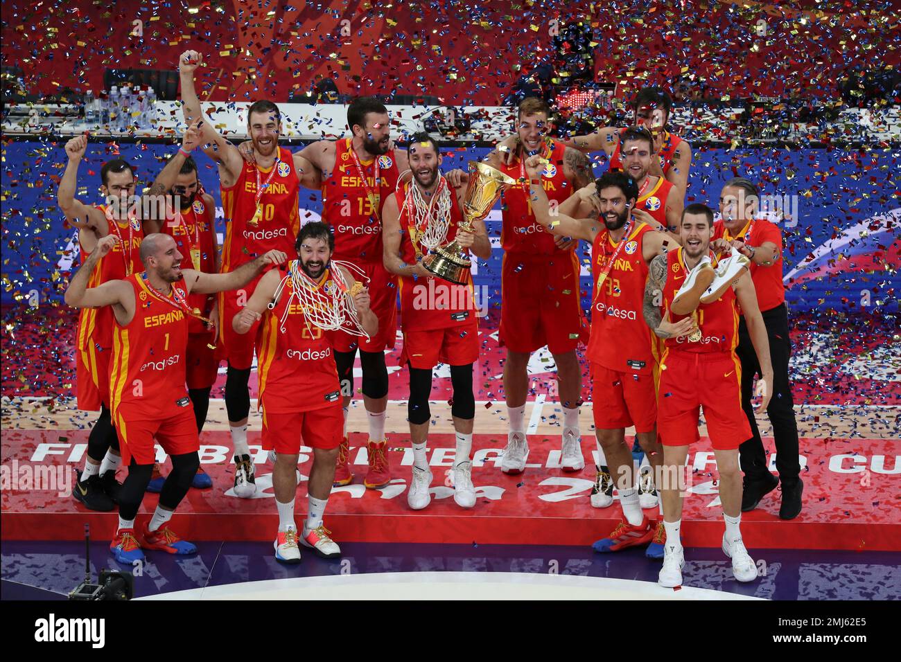 Spanish team players celebrate with their winning trophy for the FIBA ...