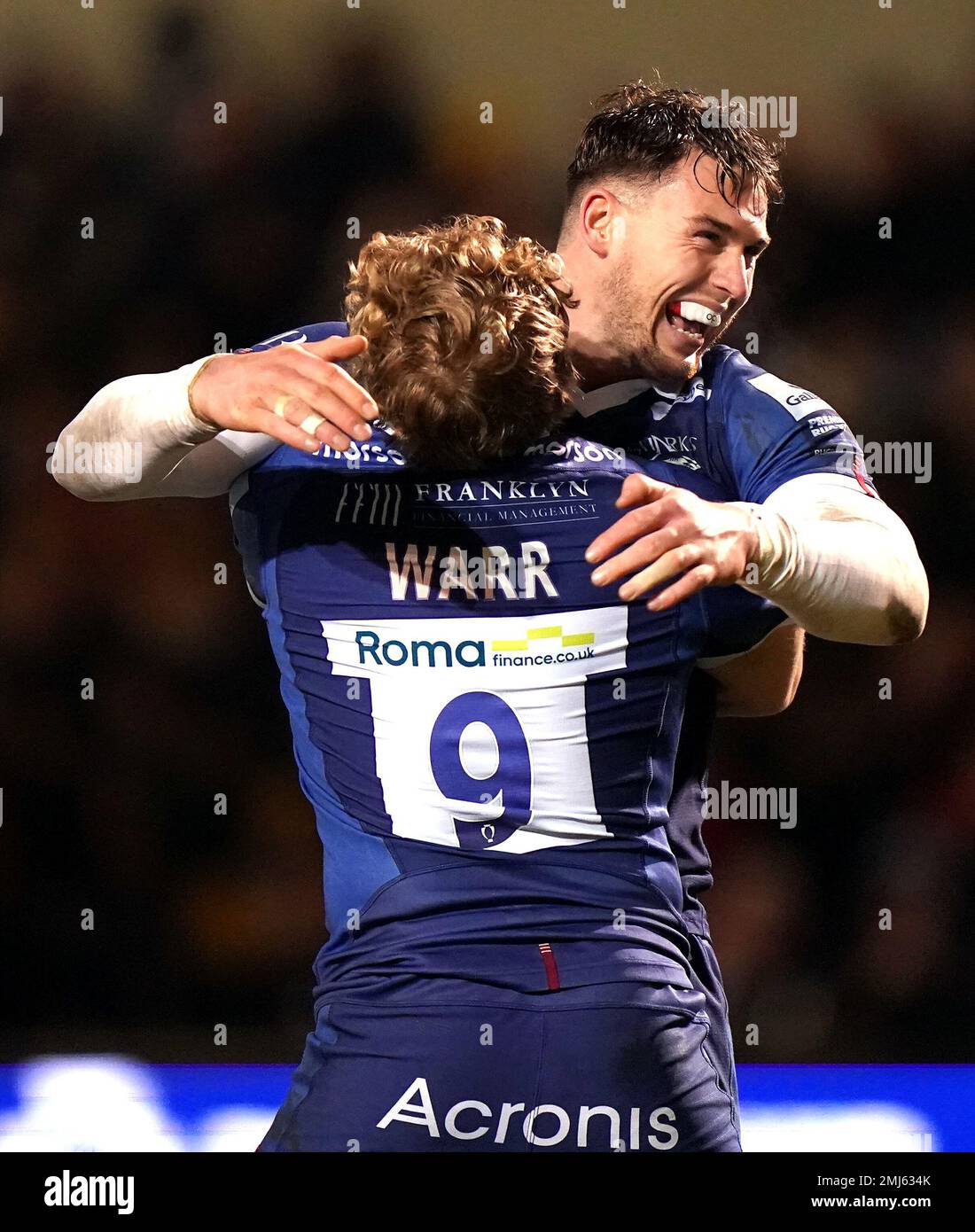 Sale Sharks's Tom Roebuck (right) celebrates scoring his side's third ...