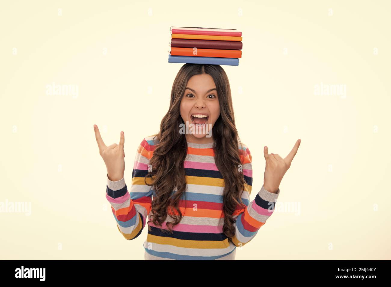 Schoolgirl with copy book posing on isolated background. Literature ...
