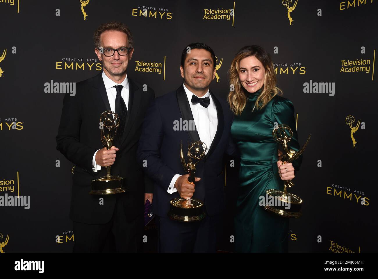Sam Bisbee, from left, Rudy Valdez and Theodora Dunlap, winners of the award for exceptional ...