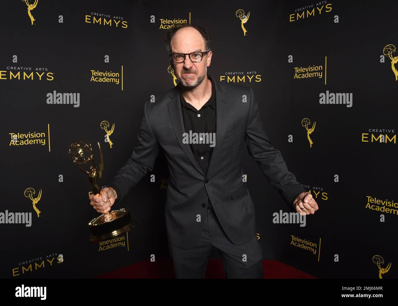 Matt Selman of "The Simpsons" poses with the award for outstanding ...