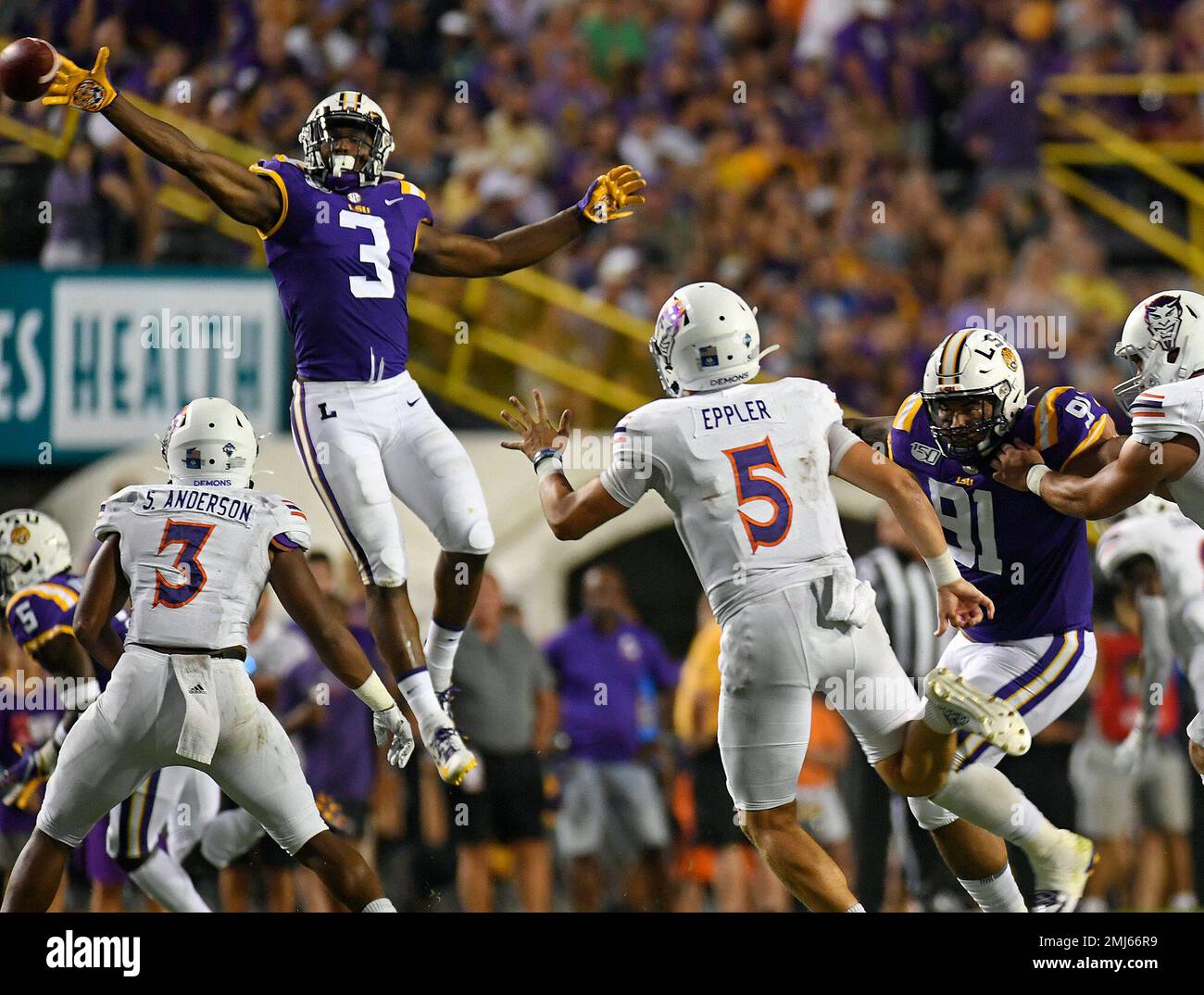LSU safety Jacoby Stevens (3) tries to block a pass by Northwestern ...