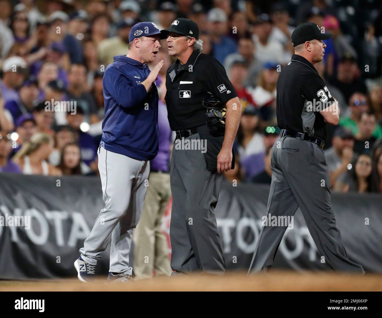 From left, San Diego Padres manager Andy Green argues with umpire Paul Nauert after Green was ...
