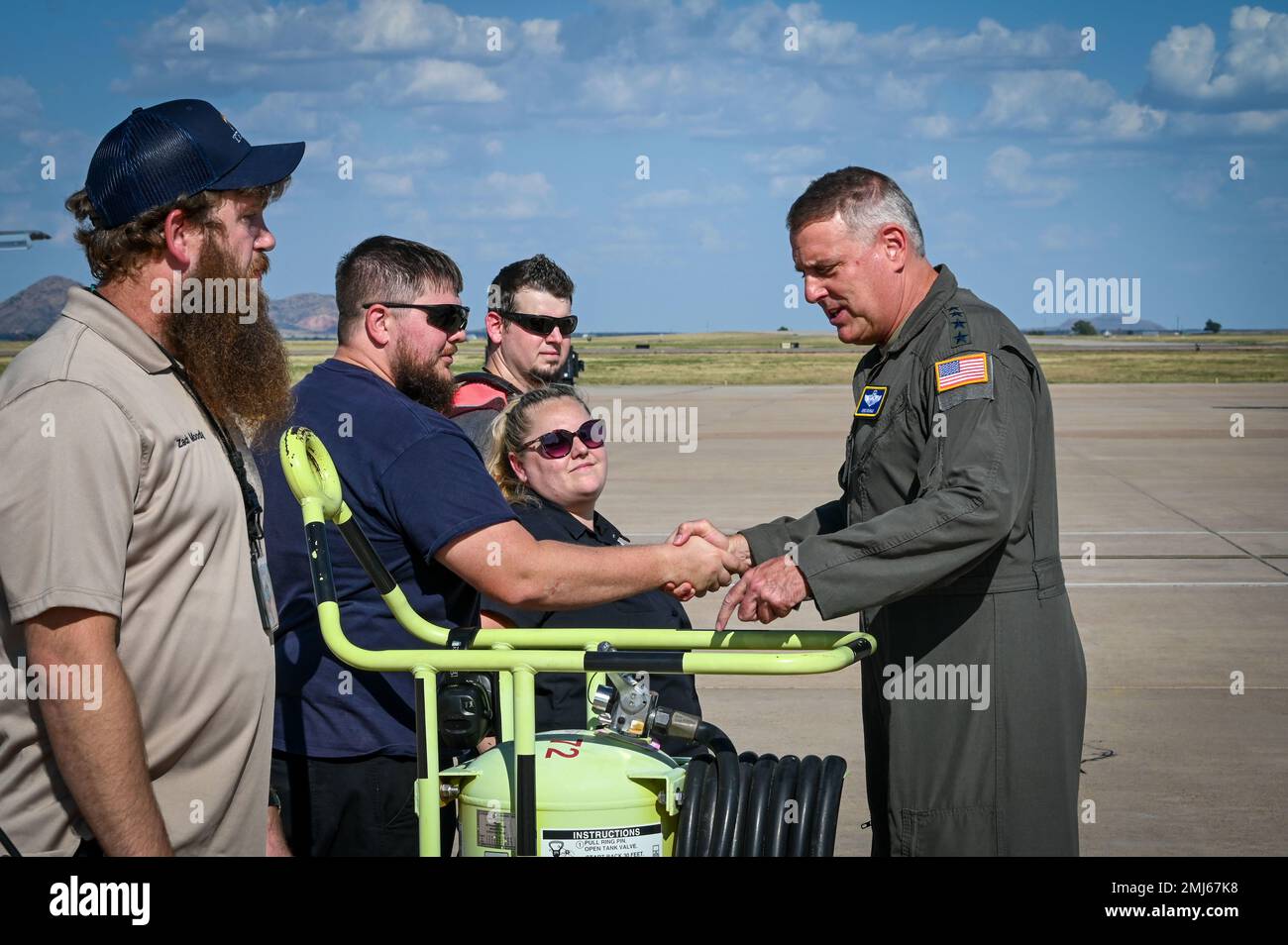 U.S. Air Force Gen. Mike Minihan, Air Mobility Command commander, coins ...