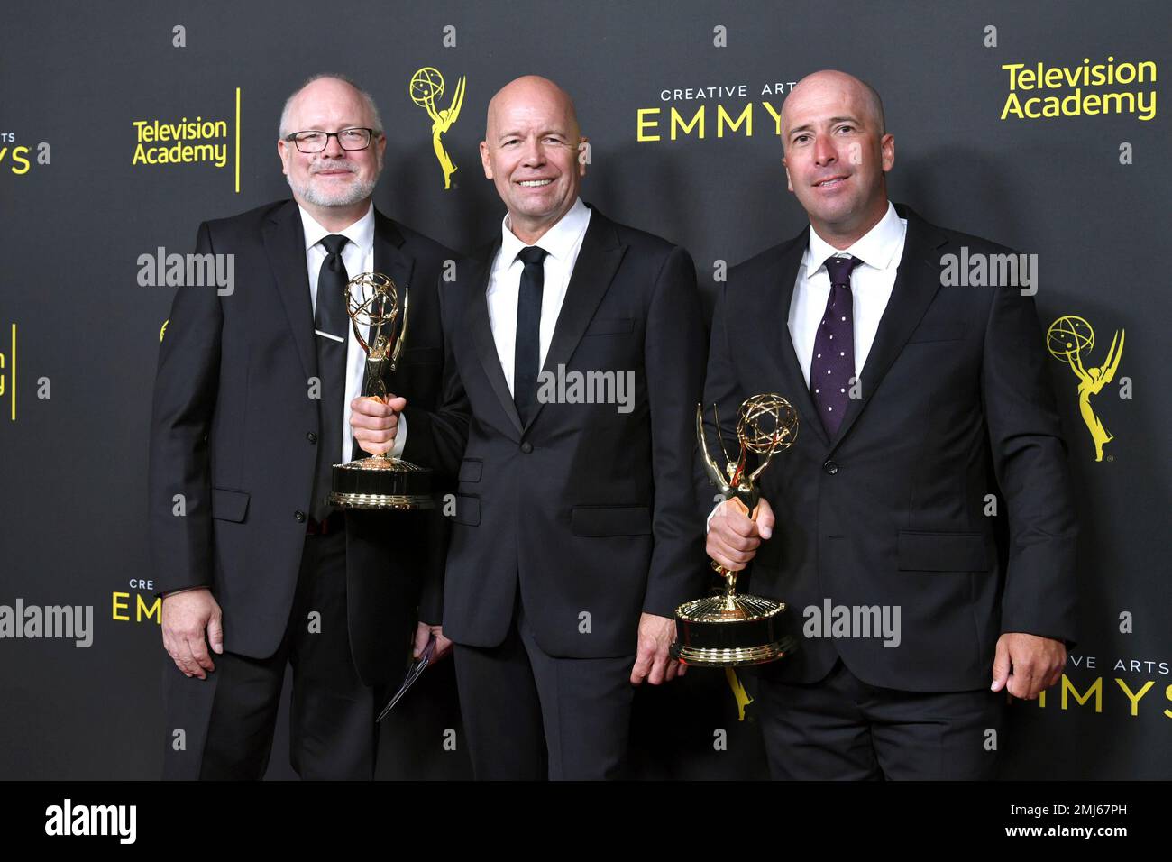 Richard McGuinness, from left, William McGuinness, and Tim Stasse pose ...