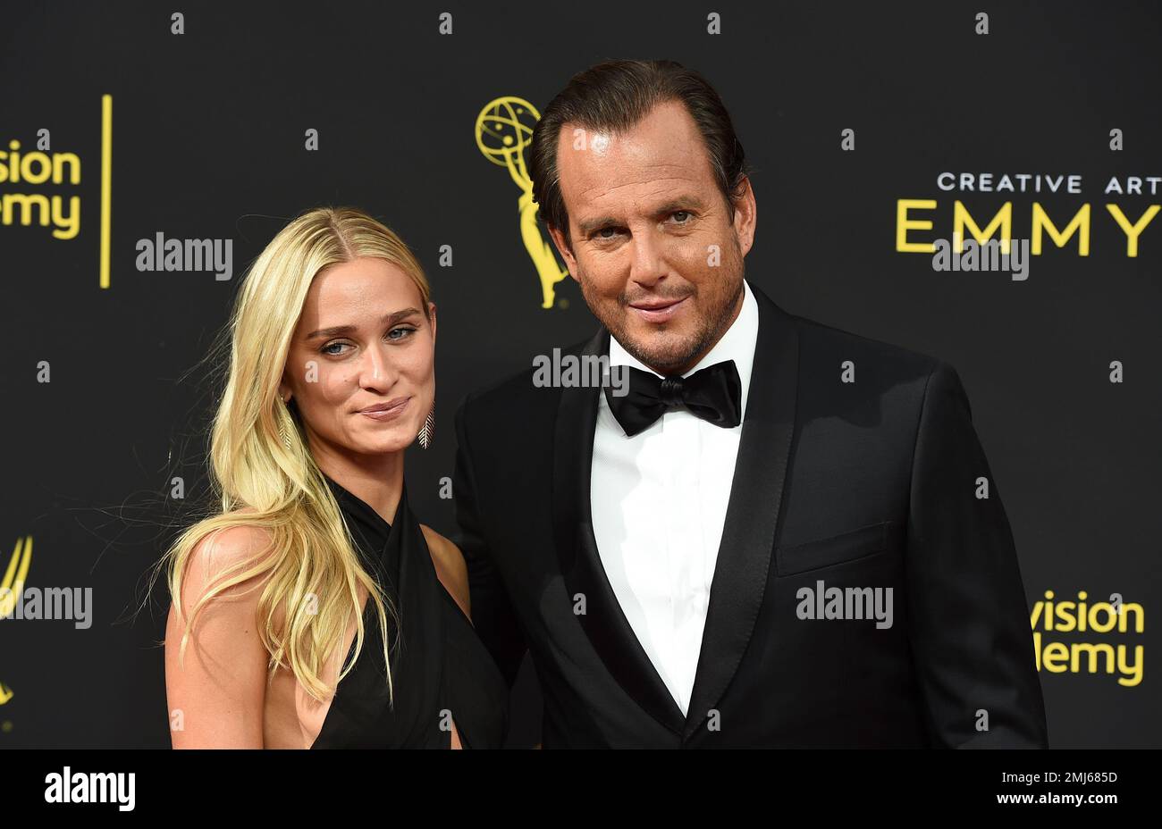 Alessandra Brawn, left, and Will Arnett arrive at night one of the ...