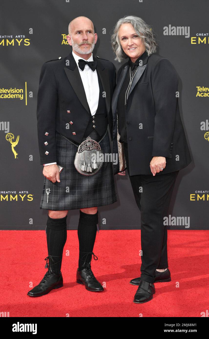 Rob Eric, left, and Jennifer Lane arrive at night one of the Creative ...