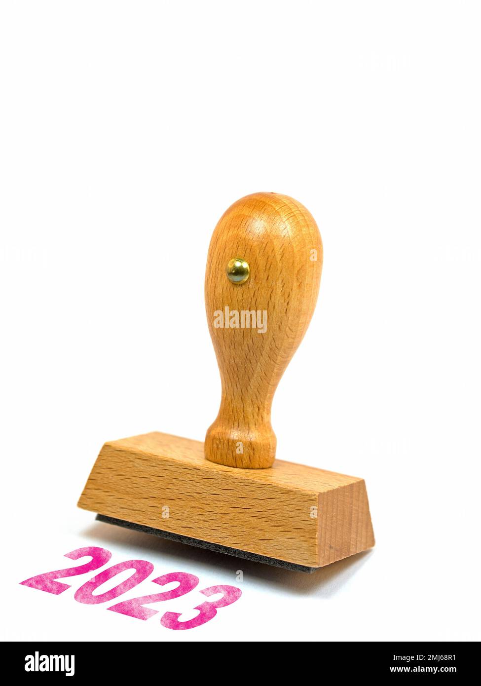 Wooden stamp with the imprint 2023 against a white background Stock ...