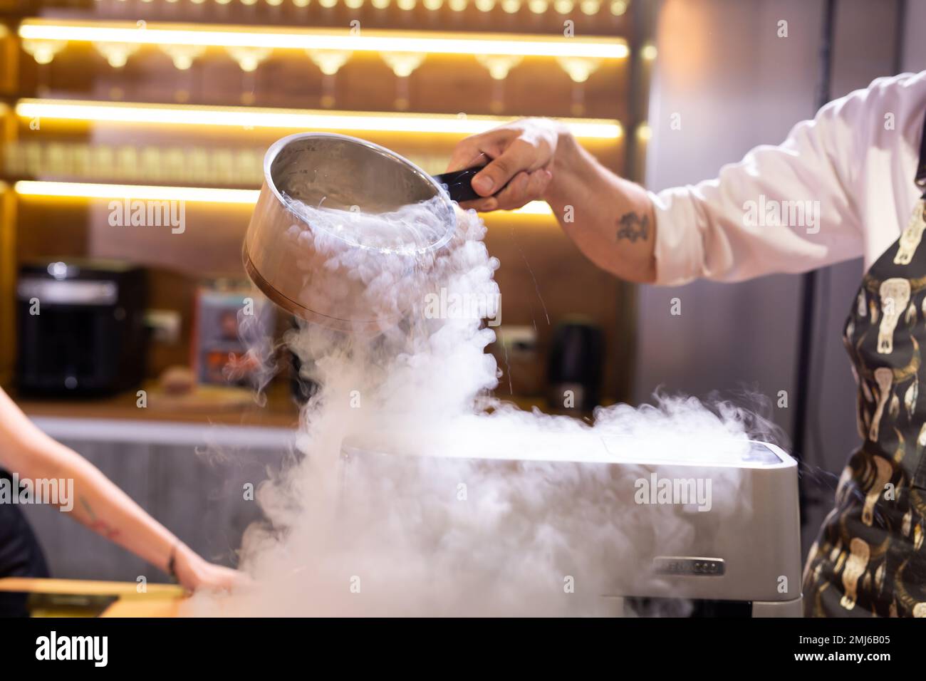 smoke vapor dry ice in bowl in the kitchen Stock Photo - Alamy