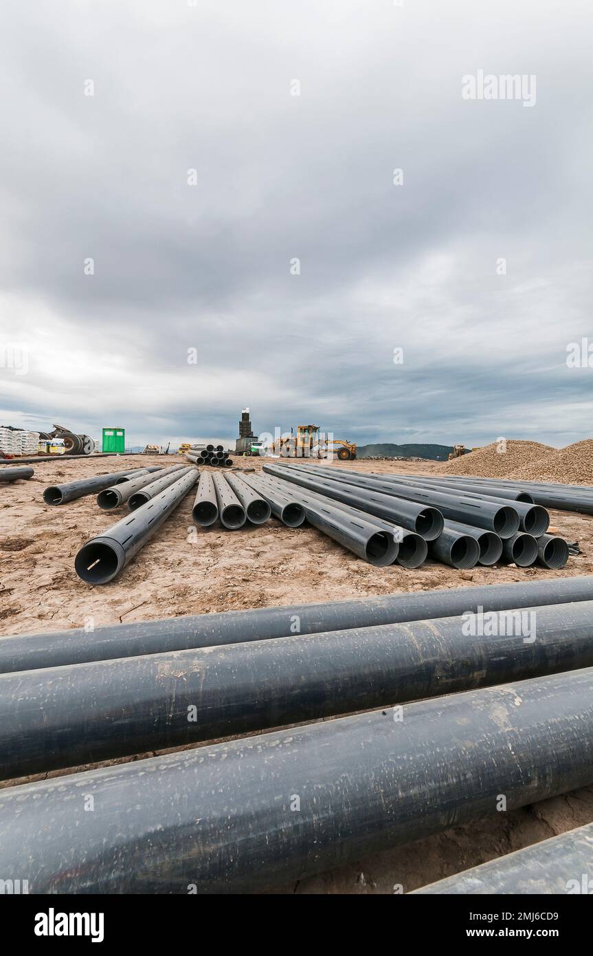 PVC slotted tubing used in methane gas wells at an active landfill are ...