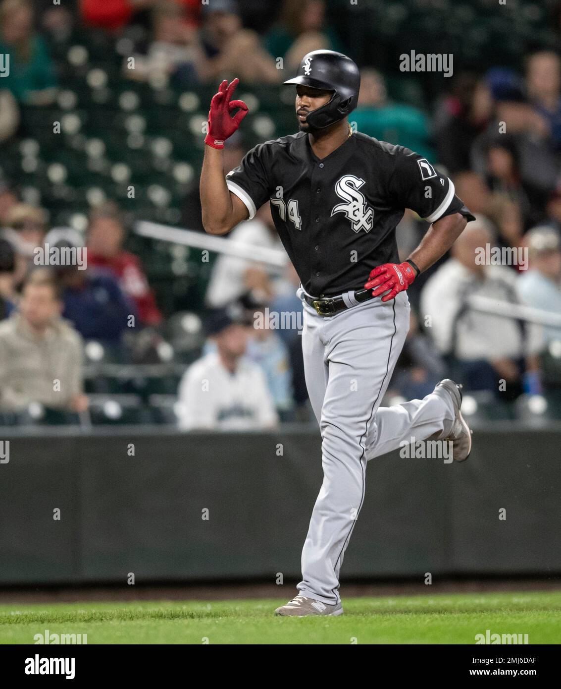 Chicago White Sox's Eloy Jimenez gestures as he rounds bases after ...