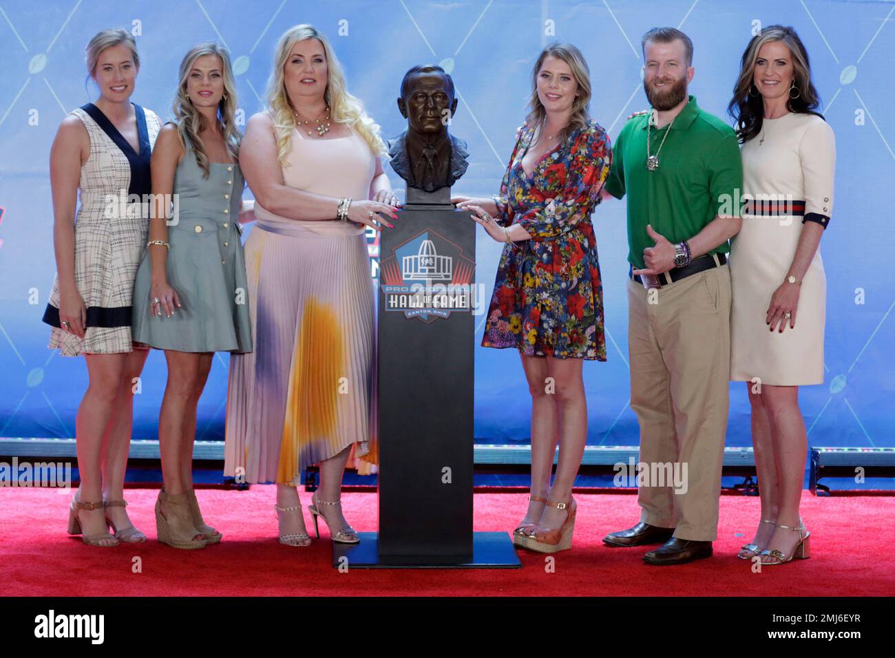 FILE - In this Aug. 3, 2019, file photo, members of the Bowlen family ...