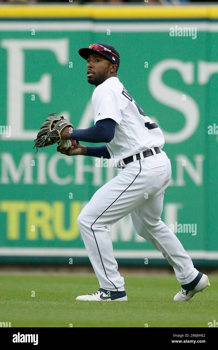 Detroit Tigers' Travis Demeritte throws in a ball hit by New York ...