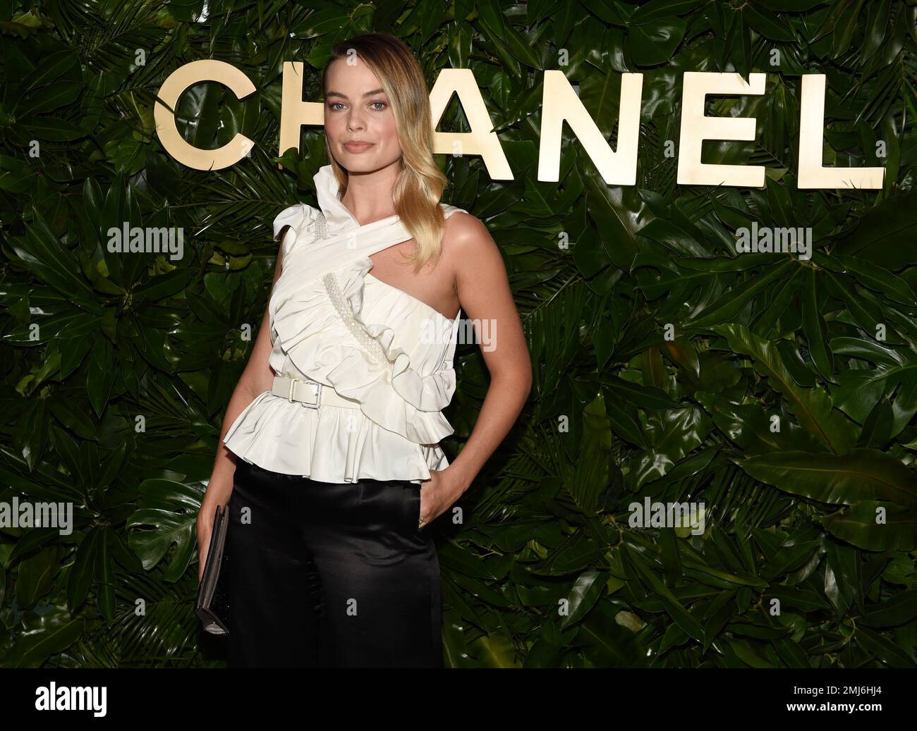 Actress Margot Robbie poses at the launch of the Gabrielle Chanel ...