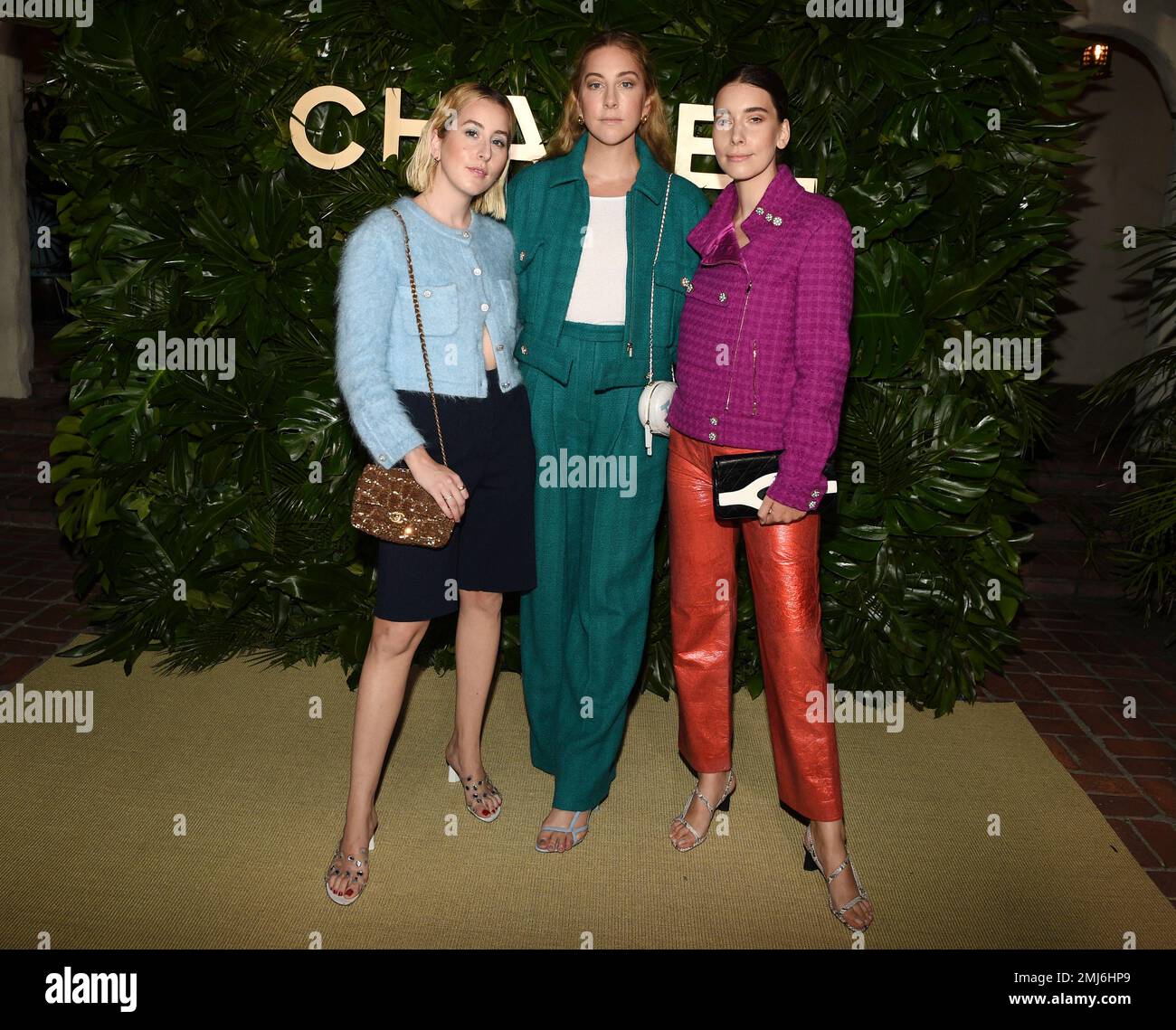 Sisters Alana, left, Este, center, and Danielle Haim of the band HAIM ...