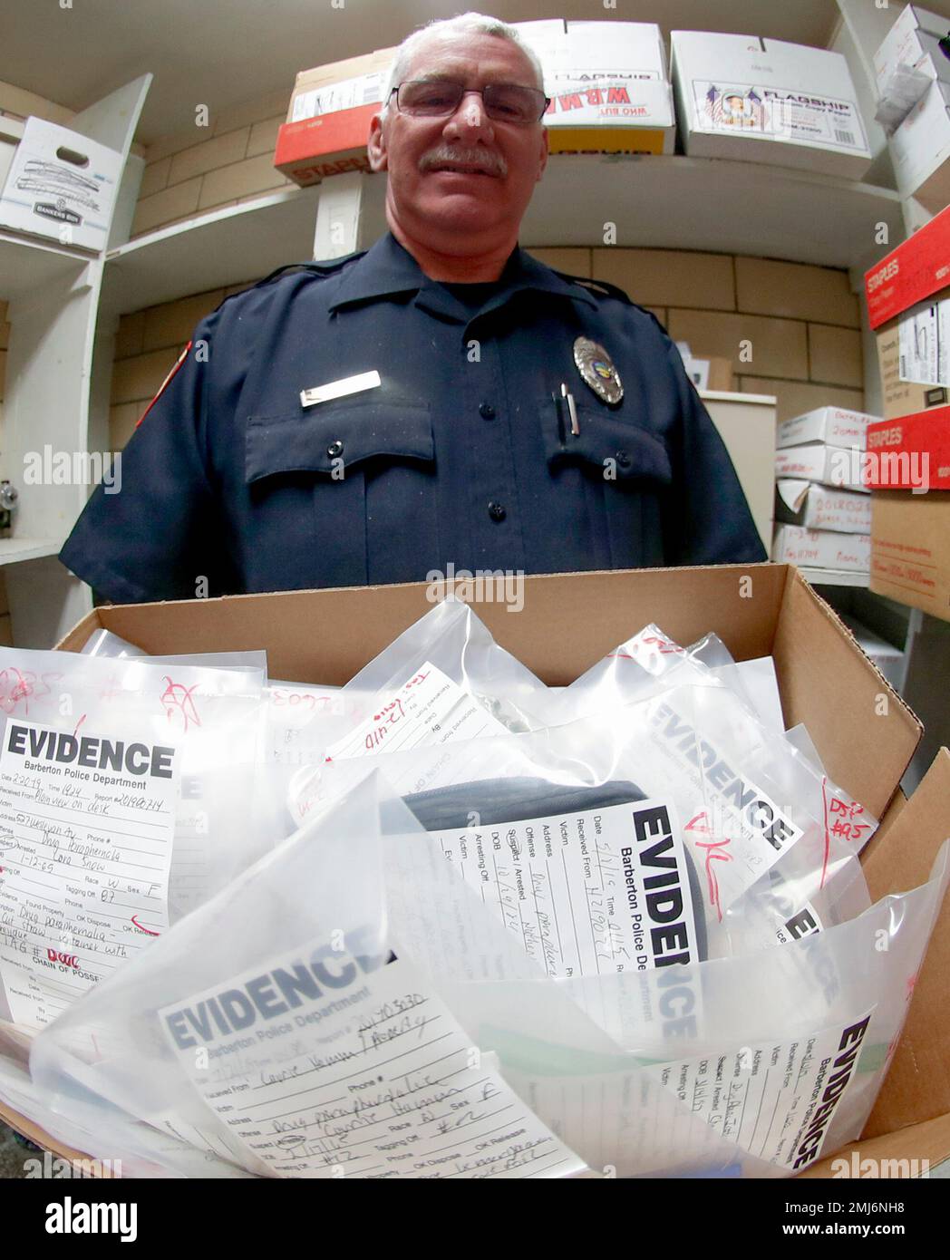 Barberton narcotics detective Will Pfeiffer shows stored narcotics ...