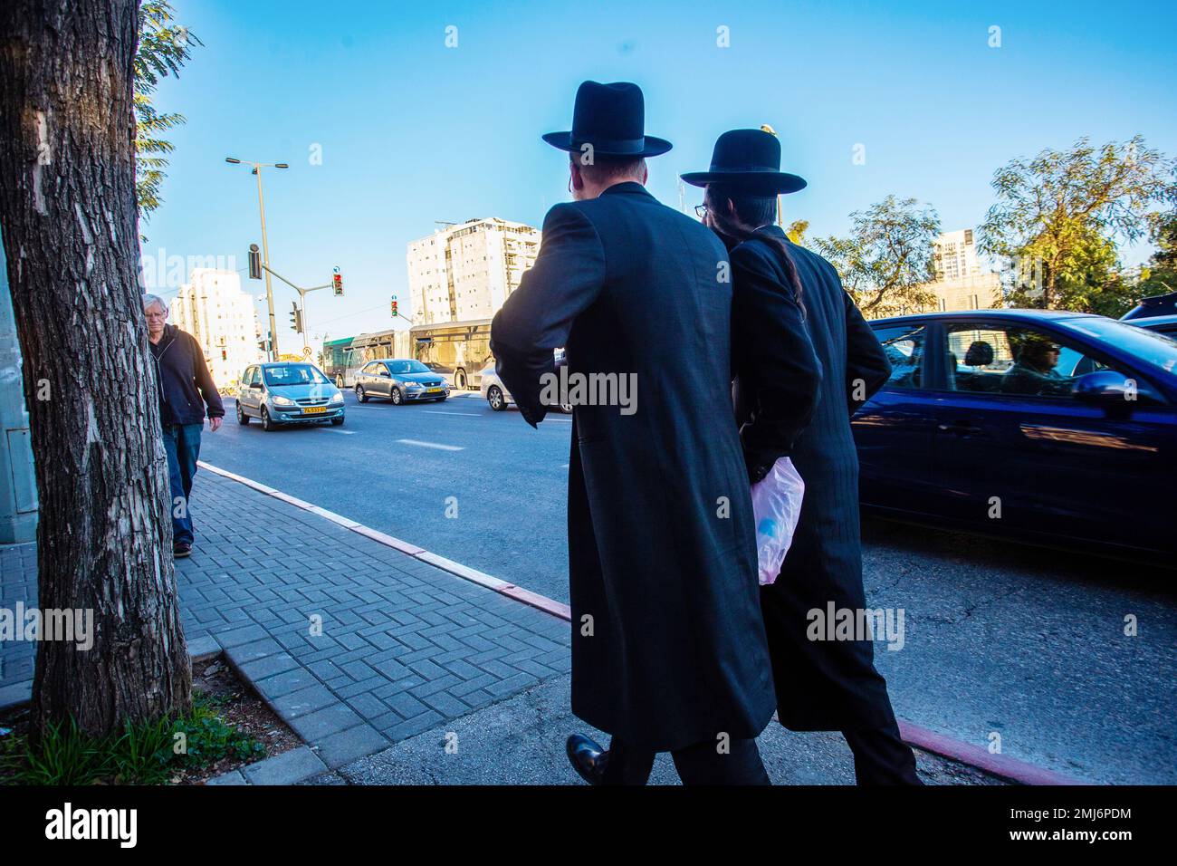 12-25-2014 Jerusalem , Israel. 2 religious Jews in hats walking in ...