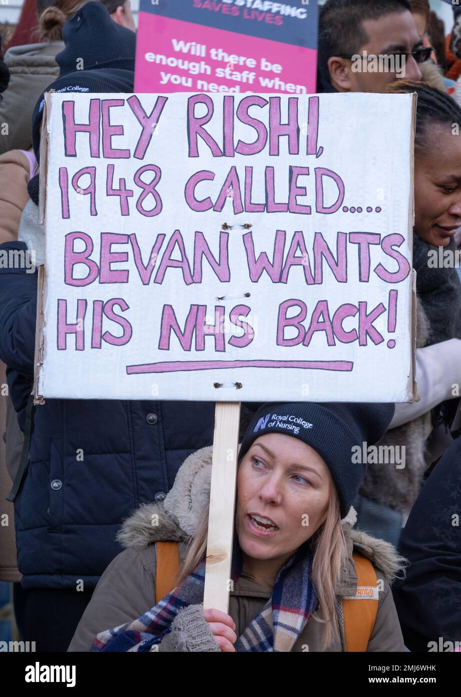 Striking nurses with placards, demonstrating outside University College ...