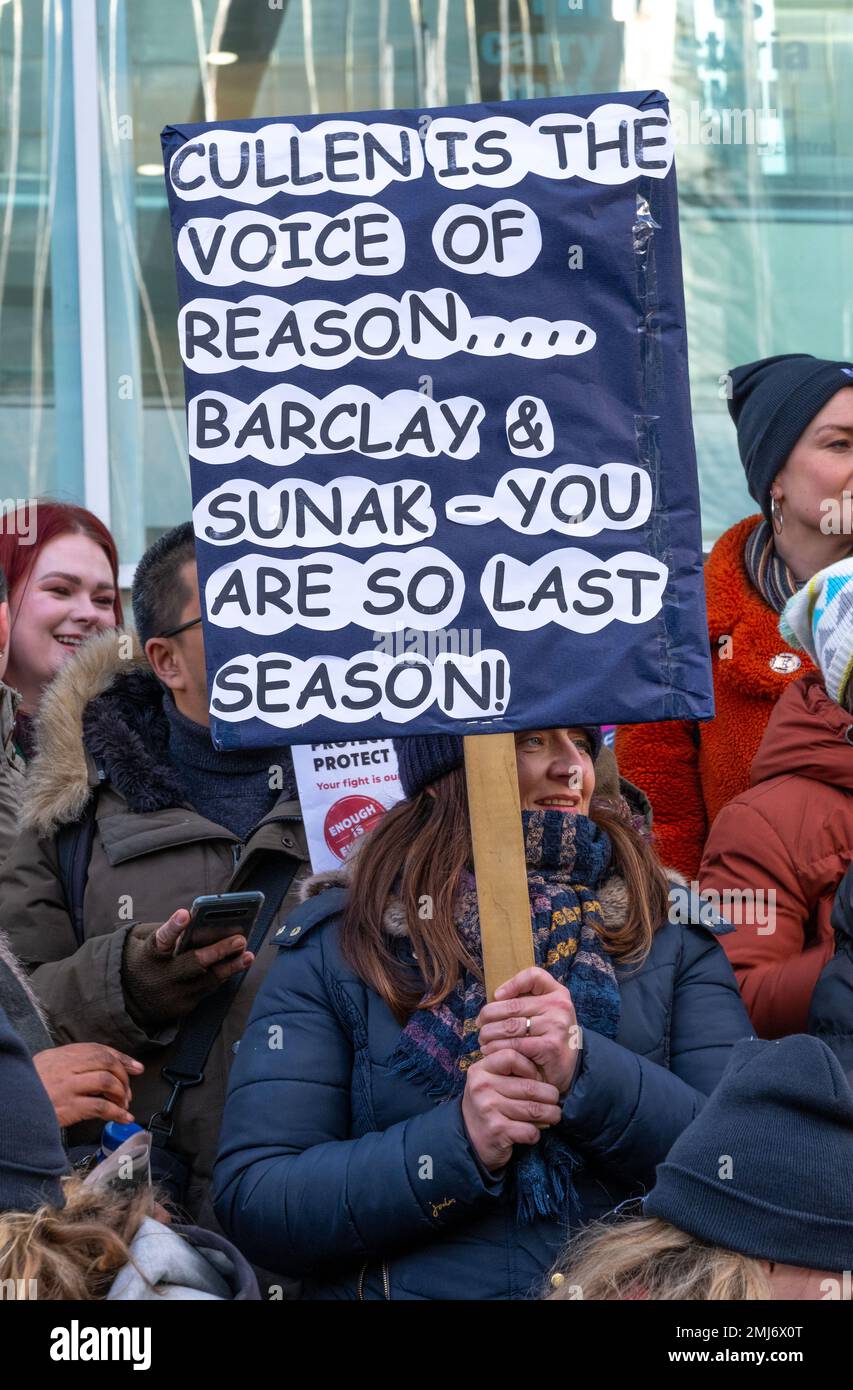 Striking nurses with placards, demonstrating outside University College ...