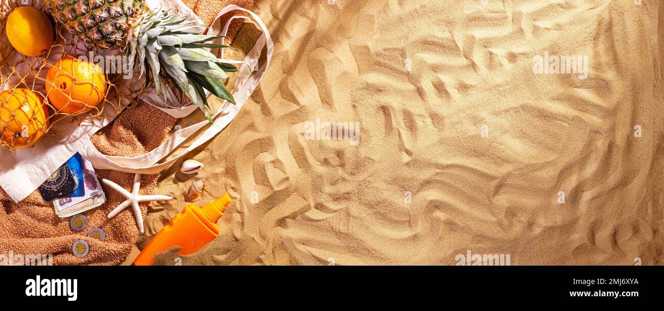 Concept of sandy beach holiday, top view, banner. Sand background with ...