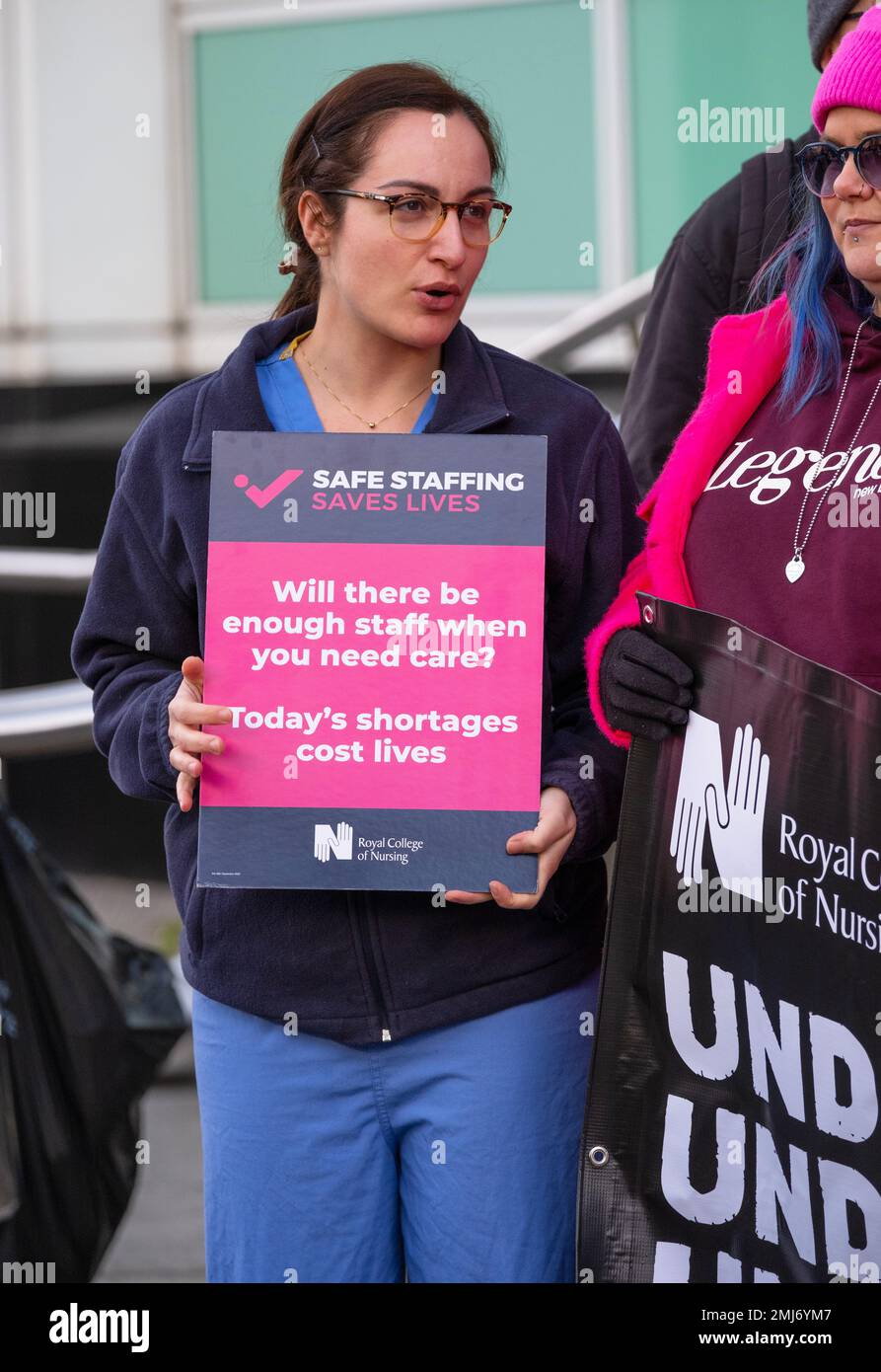 Striking nurses with placards, demonstrating outside University College ...