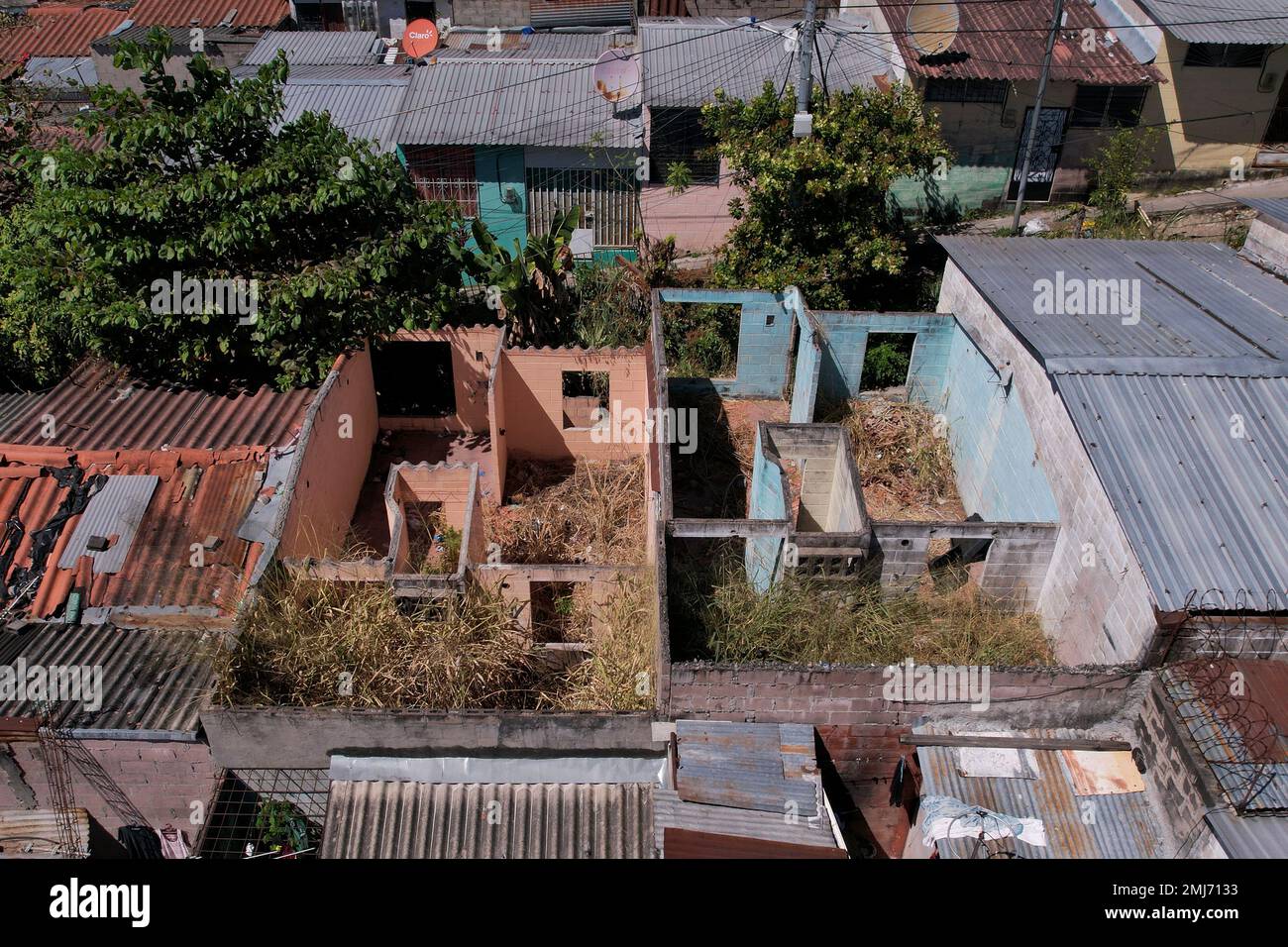 An aerial view of houses dismantled by members of the Barrio 18 Gang in ...