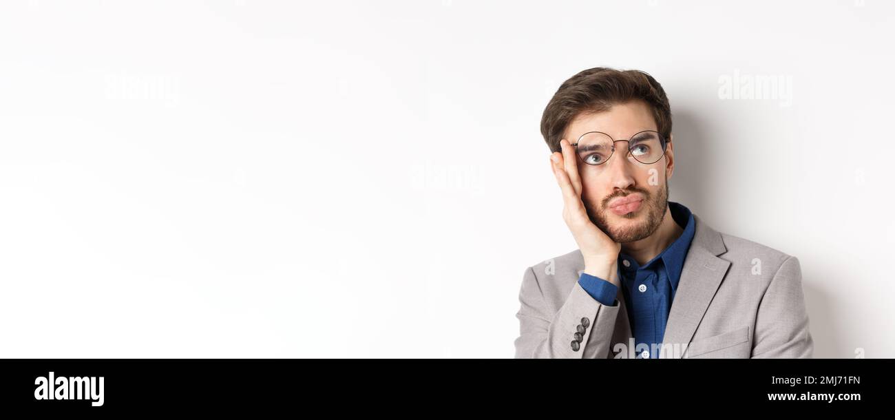 Close-up of shocked tired office worker takes-off glasses and stare at ...