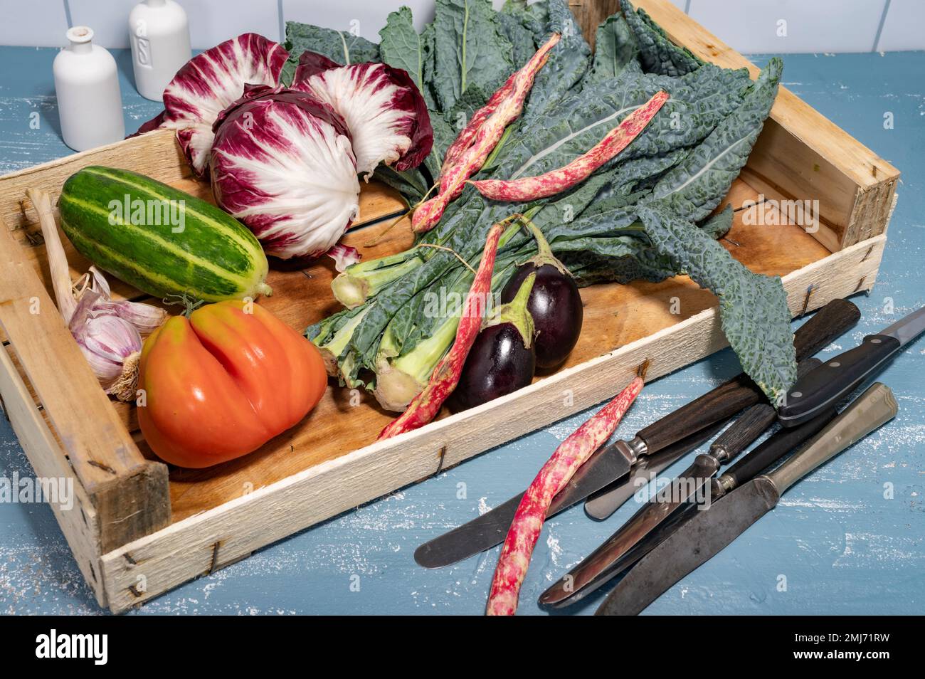 Wooden box with Mediterranean vegetables Stock Photo - Alamy