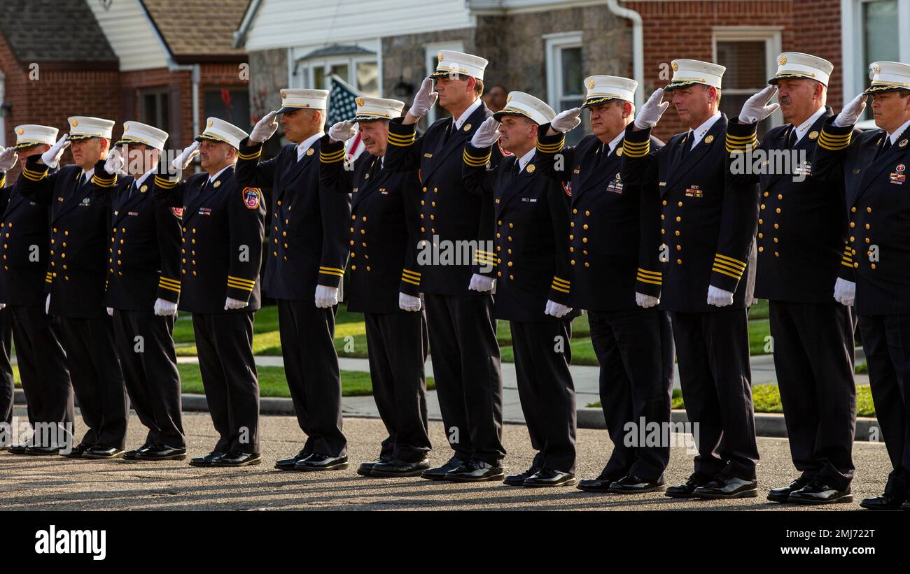 New York Fire Department members salute as they attend second funeral ...