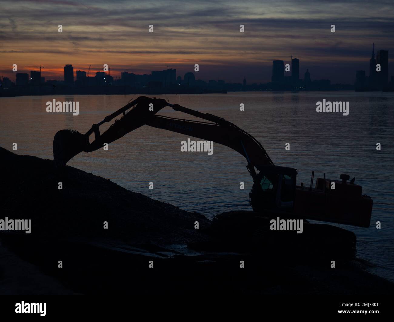 Excavator work at night. Overtime work. The work of construction ...